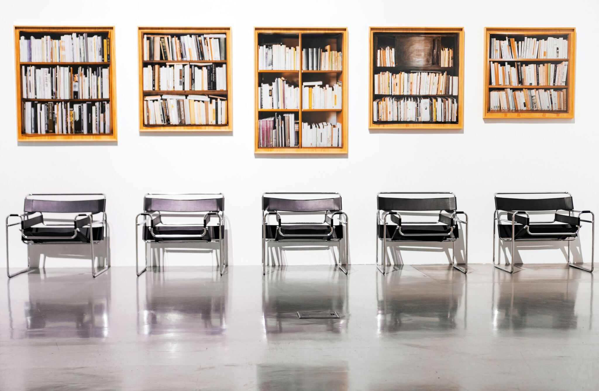 A Curator's Bookshelf: 10 Essential Reads - .ART
